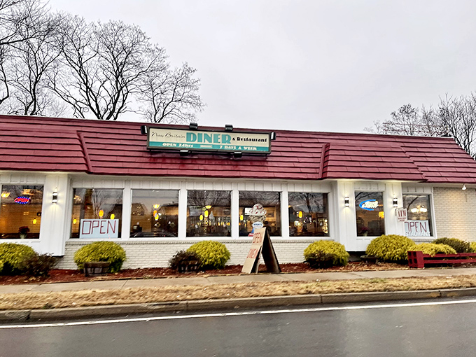 The classic red roof and welcoming windows of New Britain Diner stand as a beacon for hungry travelers, promising comfort food and nostalgia in equal measure.