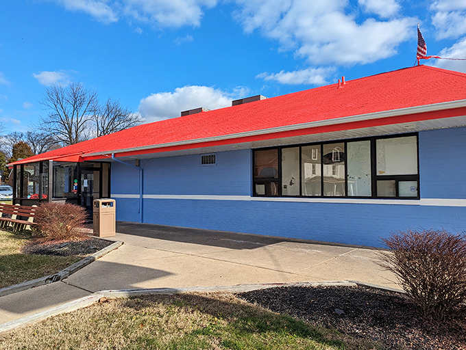 Classic Americana at its finest&mdash;the bright blue walls and eye-catching red roof signal you've found a genuine diner experience, not a corporate imitation.