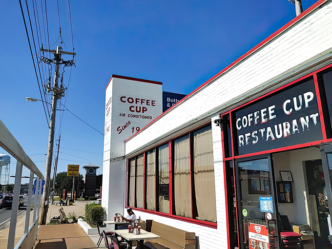 The Coffee Cup Restaurant&rsquo;s simple white exterior with red trim reflects its old-school charm, where the focus is on hearty plates and timeless diner tradition.