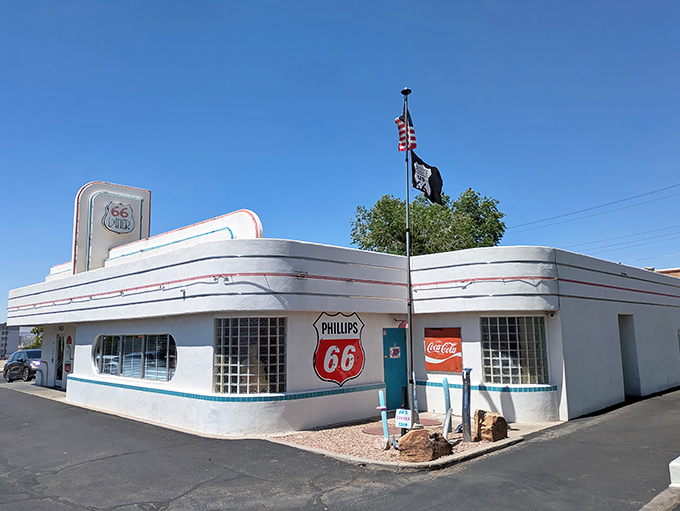 The gleaming white exterior of 66 Diner stands as a retro beacon along Route 66, promising nostalgic delights inside.
