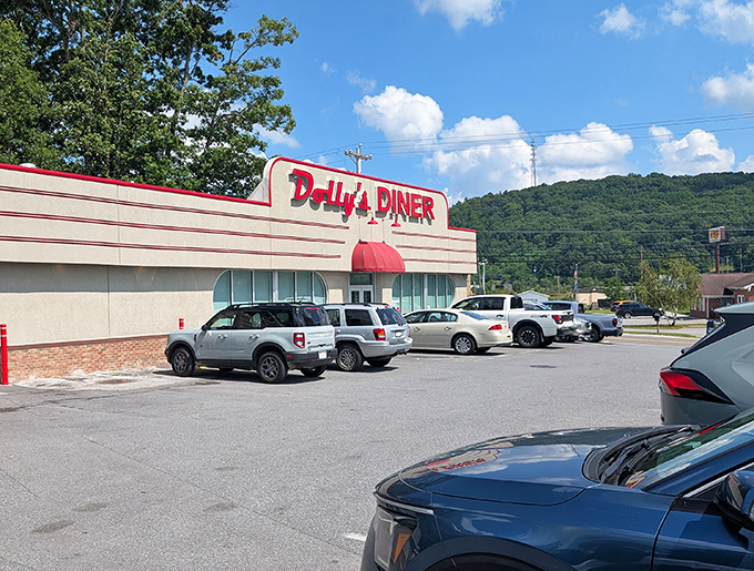 The classic cream-colored facade with bold red signage isn't just a restaurant&mdash;it's a time machine disguised as a diner in the West Virginia hills.