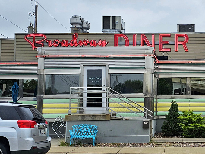 Another angle of this chrome time machine, where the neon sign promises delicious nostalgia served all day with a side of small-town charm.
