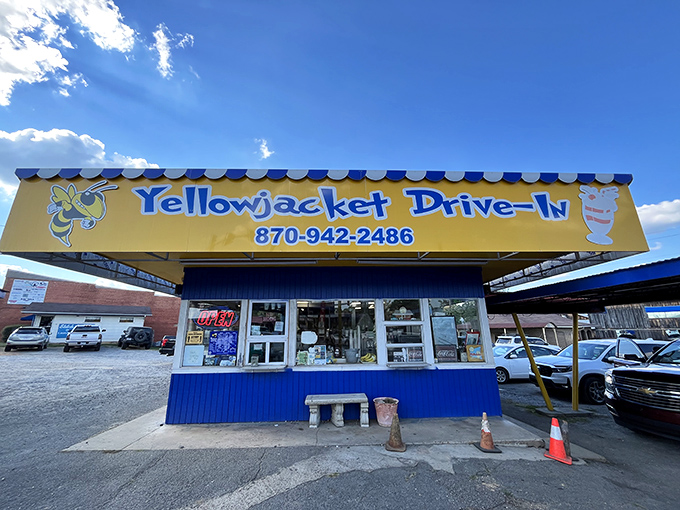 The bright yellow and blue exterior of Yellow Jacket Drive-In stands like a beacon of hope for hungry travelers on Highway 167 in Sheridan.