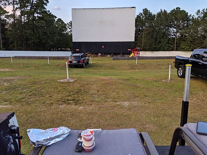 The perfect setup at Hwy 21 Drive-In: blankets ready, drinks poured, and a blank screen awaiting twilight magic.