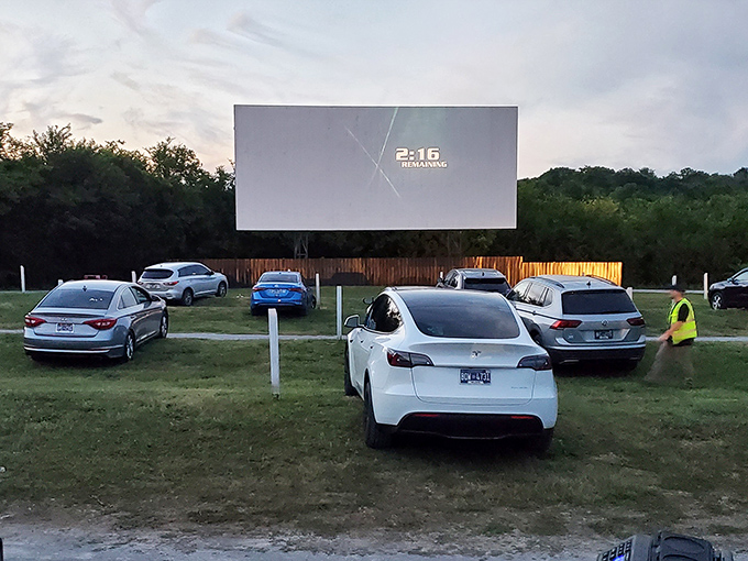 Modern cars line up before the massive screen, where "2 remaining" flashes&mdash;the most thrilling countdown in Tennessee entertainment.