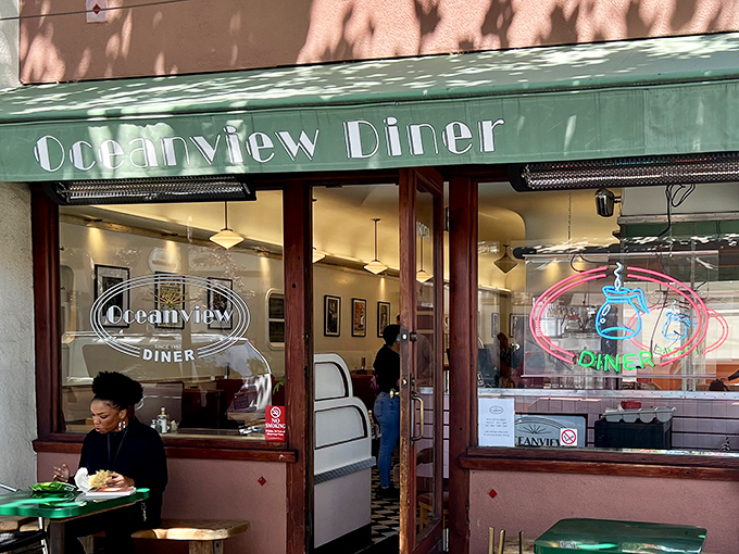 The green awning and neon sign beckon like an old friend. Classic diner charm with a Berkeley twist&mdash;no actual ocean view required.