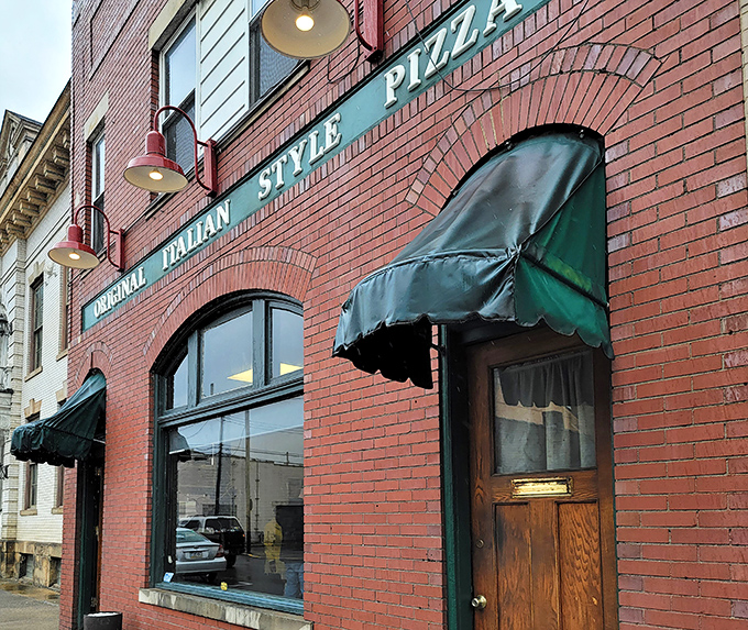 Those green awnings and vintage "Original Italian Style Pizza" sign aren't just decoration &ndash; they're a promise of old-school pizza excellence that's been kept for generations.