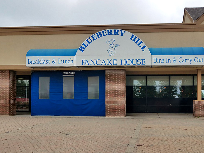 That iconic blue and white sign has been the North Star for Aurora's breakfast pilgrims, promising salvation from sad home-cooked eggs.