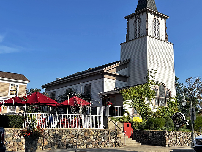 The holy trinity of dining: historic architecture, outdoor seating, and a steeple that practically screams "come worship at the altar of good food."