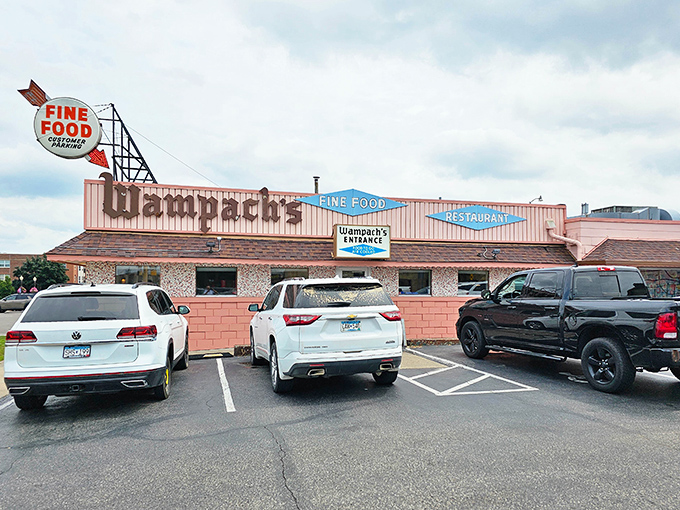 That iconic pink exterior and vintage "FINE FOOD" sign aren't just retro charm&mdash;they're a beacon of breakfast hope for hungry Minnesotans seeking comfort food salvation.