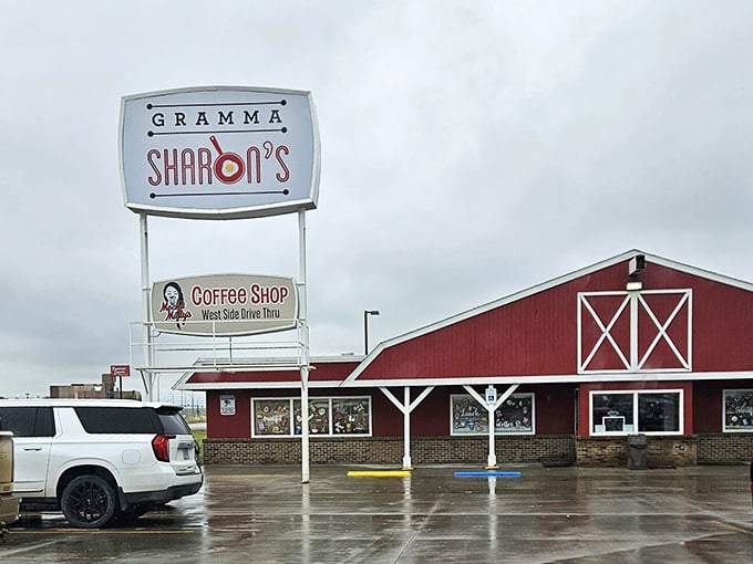 The iconic red barn-style exterior of Gramma Sharon's stands like a beacon of breakfast hope on Williston's horizon. Comfort food salvation awaits inside!