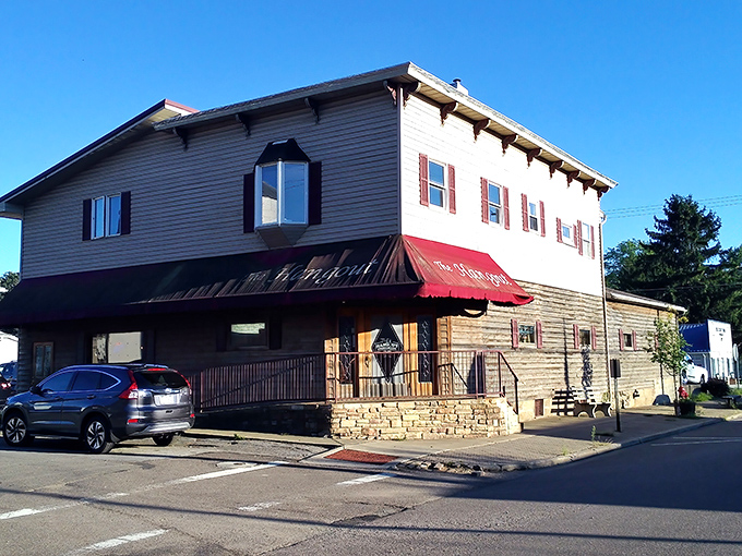 The Hangout's welcoming exterior with its signature red awning stands as a beacon of comfort food in downtown Danville, where hungry travelers and locals alike find culinary salvation.