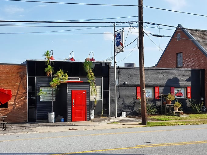 That red door isn't playing hard-to-get &ndash; it's guarding the entrance to burger paradise like a crimson sentinel of deliciousness.