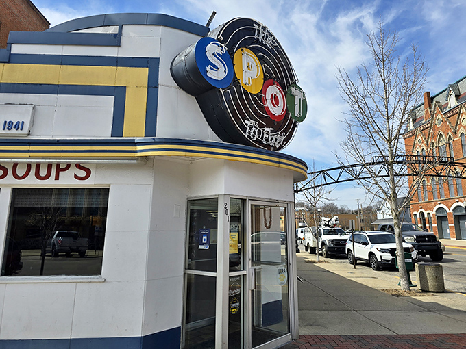 The iconic neon sign of The Spot Restaurant glows like a beacon of comfort food hope in downtown Sidney. Art Deco meets Midwest charm.