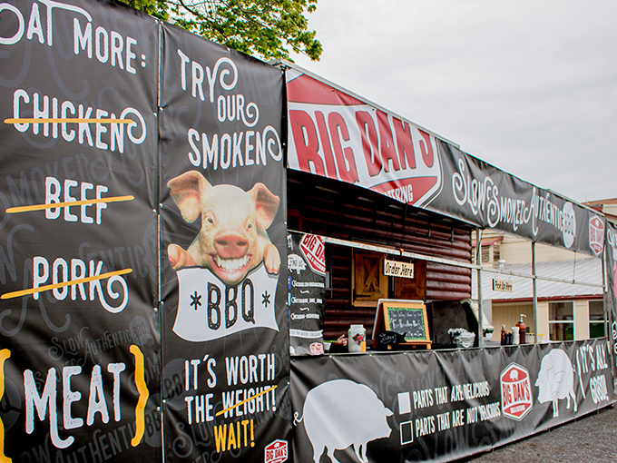 The smiling pig on Big Dan's banner isn't just cute marketing&mdash;it's a promise of smoky perfection waiting inside this rustic Catawissa treasure.