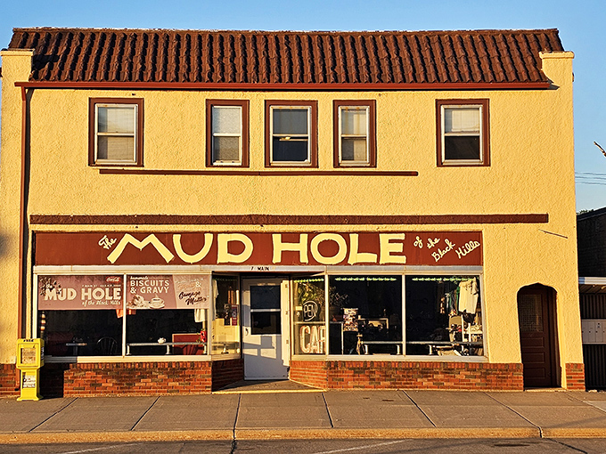 The name might make you hesitate, but that storefront promises comfort food nirvana. Those "Biscuits & Gravy" banners aren't just advertising—they're a solemn vow.