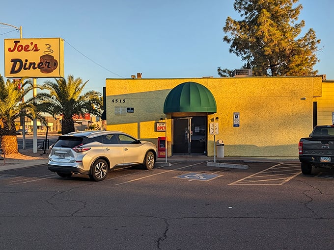 The unassuming yellow exterior of Joe's Diner stands like a time capsule in Phoenix, promising honest food without the frills or Instagram filters.