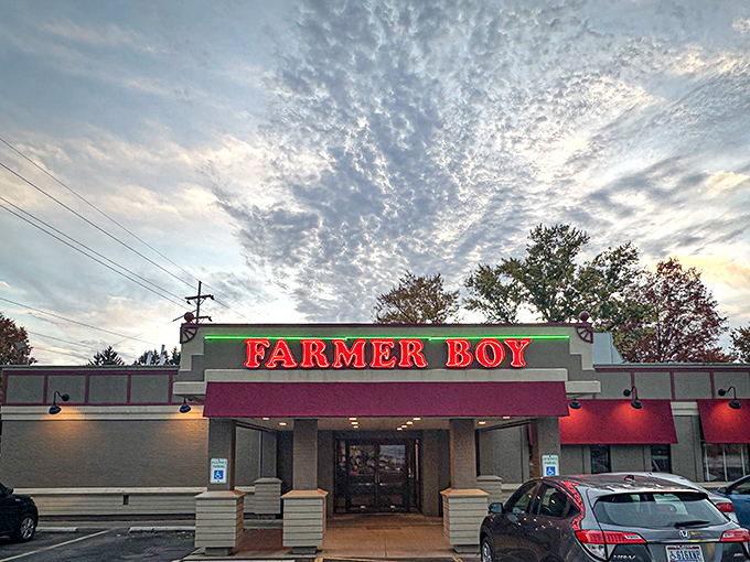 The iconic red Farmer Boy sign glows like a beacon for breakfast lovers, promising comfort food under Ohio skies that seem to applaud your dining choice.