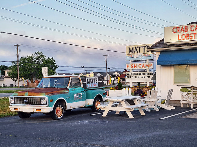 The vintage turquoise truck parked outside Matt's Fish Camp isn't just decoration—it's a promise of the no-nonsense, authentic seafood experience waiting inside.