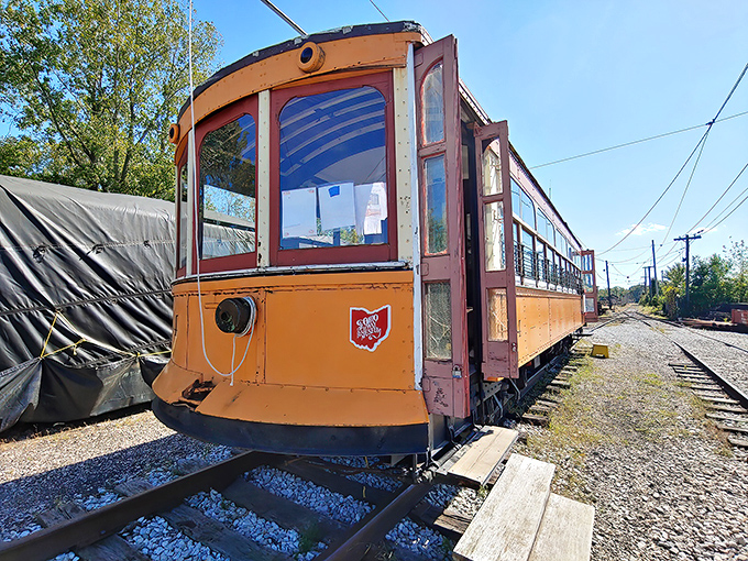 This vibrant orange interurban car with its distinctive Ohio emblem once whisked passengers between bustling Midwestern towns.