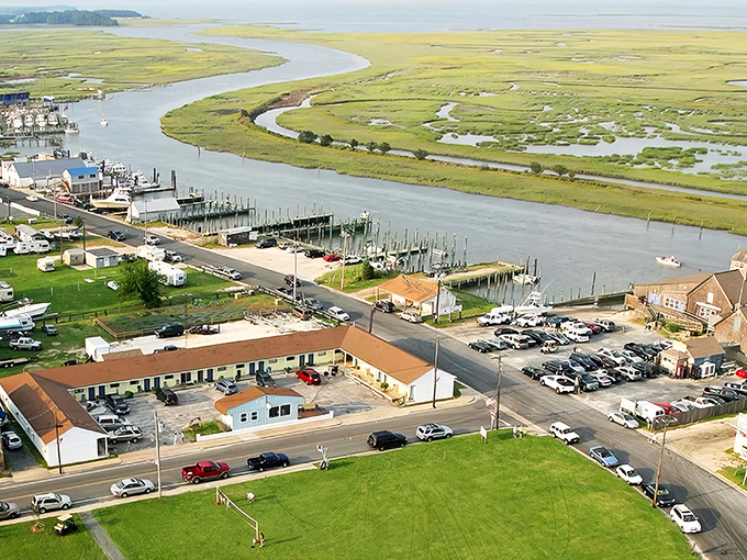 Aerial paradise where land meets water in a perfect dance. Wachapreague's marina and marshlands create a tapestry of coastal living that no artist could fully capture.