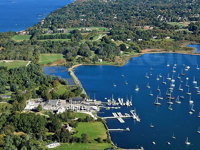 Bristol's harbor view from above reveals a sailor's paradise – a perfect blend of blue waters, green spaces, and boats bobbing like patient sentinels.