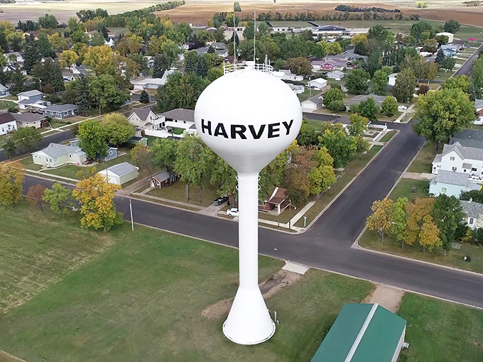 Harvey's iconic water tower stands sentinel over the town like a friendly neighborhood watchman, announcing your arrival to this peaceful prairie oasis.