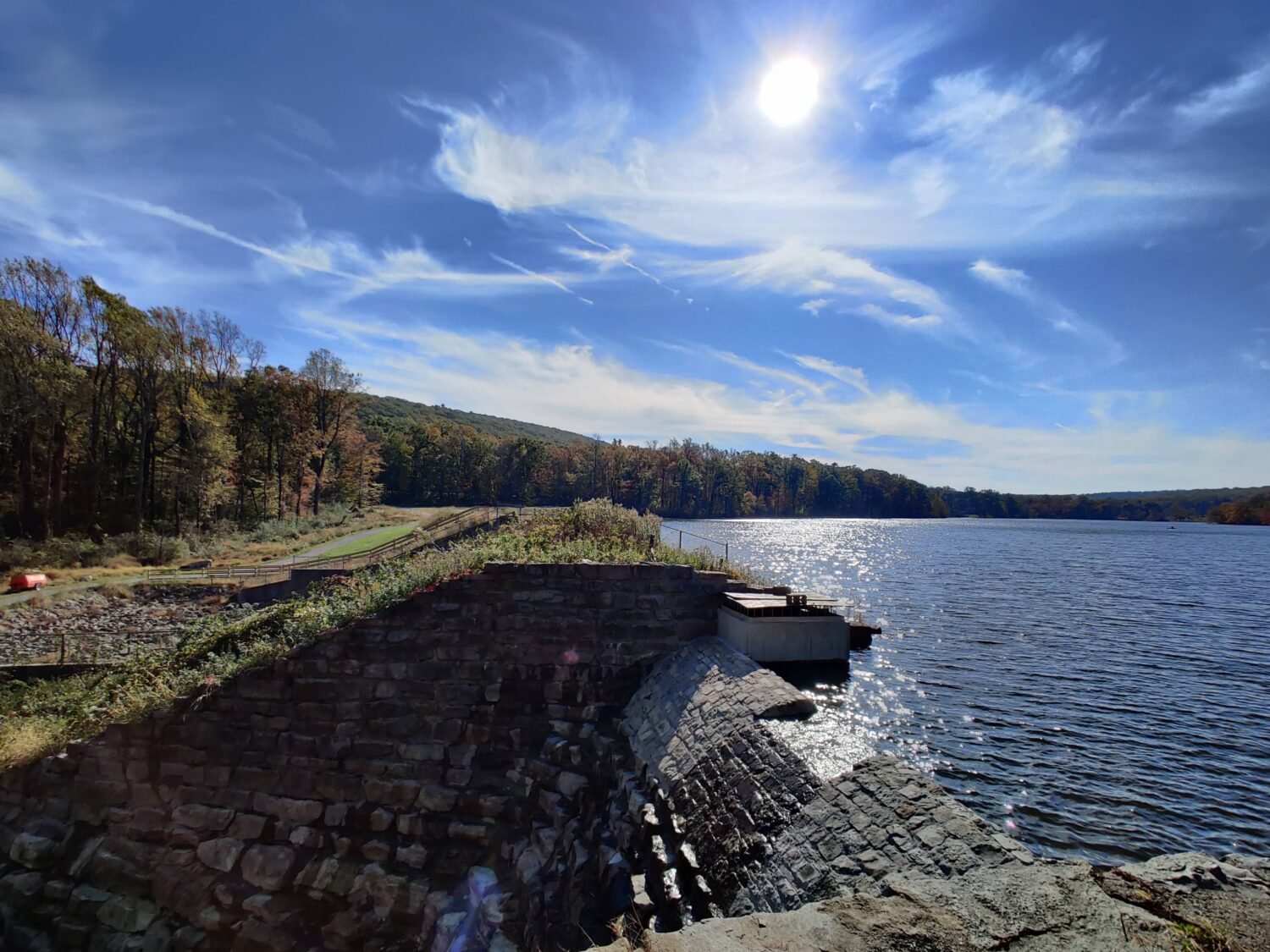 Mirror-like waters reflect autumn's fiery palette at French Creek State Park, nature's own masterpiece that changes with each passing season.
