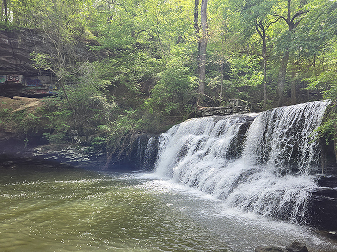 Nature's own infinity pool, where the water cascades like silk curtains at a fancy theater opening.
