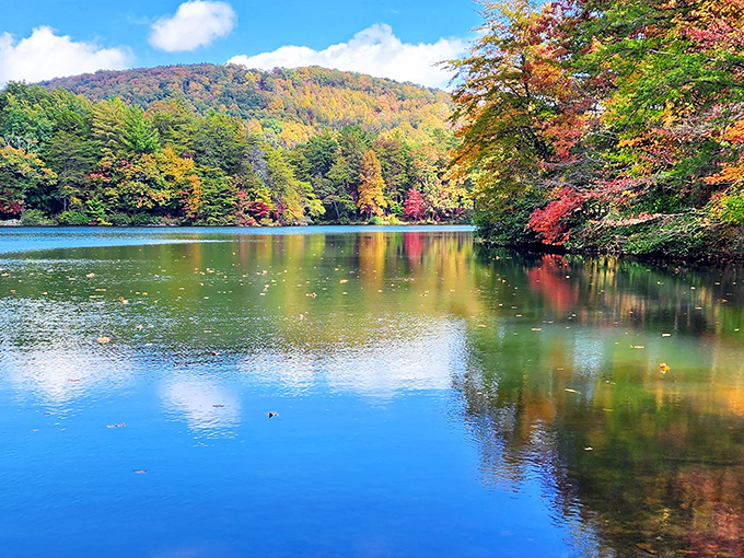 Mirror-like waters reflect fall's fiery palette, creating a double dose of beauty that even the most jaded hiker can't help but photograph.