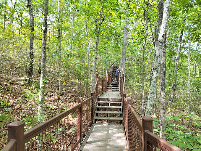 Crystal-clear water meeting ancient rock under autumn's golden canopy &ndash; nature's own infinity pool without the resort fees.