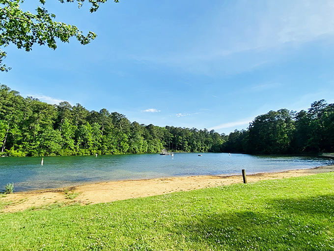 The 11-acre lake at Cliffs of the Neuse offers a perfect summer escape with crystal-clear waters reflecting the lush greenery that surrounds it.