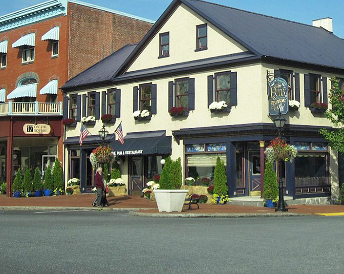 The Farnsworth House Inn stands as a culinary landmark in Gettysburg, its flower boxes and historic architecture inviting visitors to step in for a memorable meal.