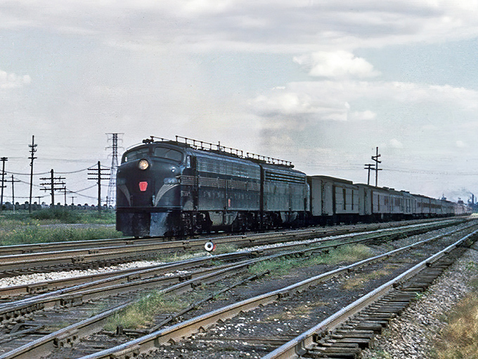 This streamlined diesel locomotive cuts an impressive figure against the horizon, a powerful reminder of when these iron horses connected America from coast to coast.