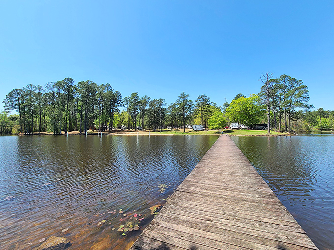 That wooden pier stretching into Geiger Lake isn't just a walkway&mdash;it's an invitation to leave your worries on the shore and step into Mississippi tranquility.