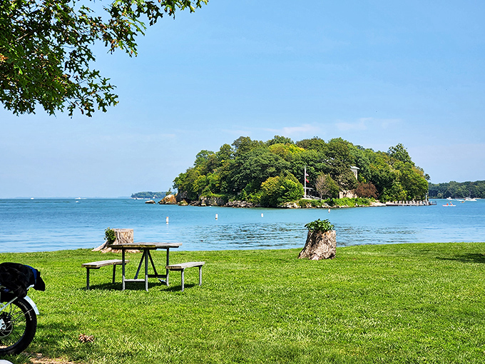 Paradise found: A lone picnic table sits before an emerald island, like nature's version of "table with a view" that doesn't require a reservation.