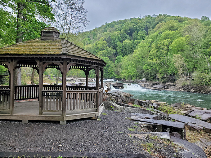 Nature's living room awaits at Valley Falls State Park, where lush green spaces and strategically placed boulders create the perfect outdoor lounge area.