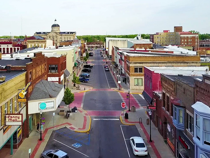 Downtown Huntington unfolds like a Norman Rockwell painting come to life, with the majestic courthouse dome watching over the colorful storefronts below.