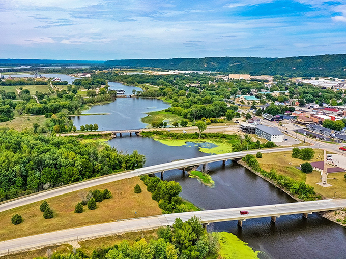 The aerial view reveals Prairie du Chien's secret weapon: a landscape where rivers, bridges, and greenery create nature's perfect retirement postcard.