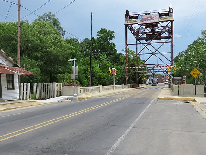 The iconic drawbridge welcomes you to Breaux Bridge like a rusty old friend who's seen a few stories but keeps the secrets of the bayou.