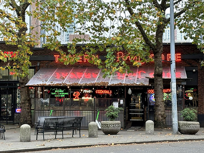 The iconic neon glow of The 5 Point Cafe beckons hungry souls through Seattle's misty evenings like a lighthouse for the famished.