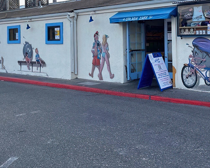 The whimsical exterior of Splash Caf&eacute; looks like a beach postcard come to life, complete with playful murals that set the perfect tone for the seafood adventure within.