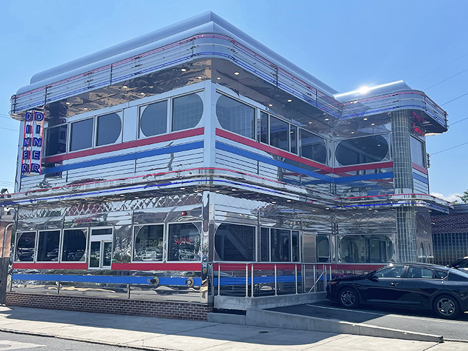 That chrome-and-stainless-steel exterior gleams like a spacecraft that decided diners serve better coffee than Mars.