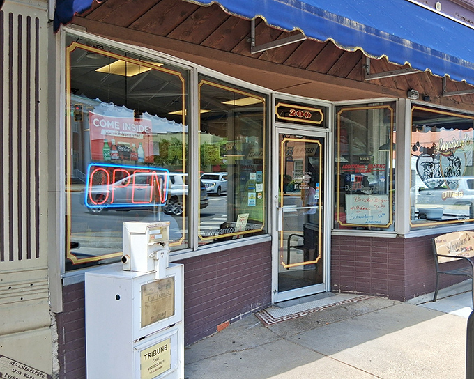 The unassuming storefront of Larrison's Diner beckons with its vintage charm and neon "OPEN" sign&mdash;proof that culinary treasures often hide in plain sight.