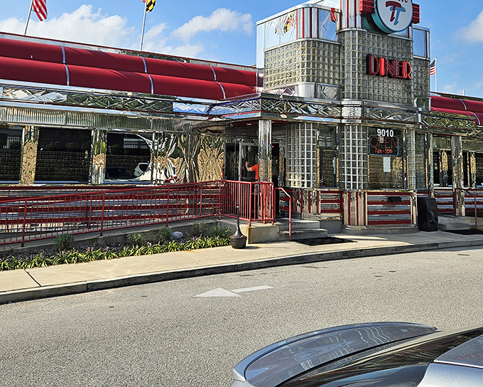 The iconic Double T sign stands proud against the sky, a beacon for hungry travelers and locals alike seeking breakfast nirvana in Nottingham.