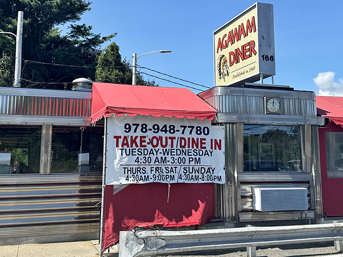 That iconic red and silver sign has guided hungry travelers for generations, standing tall against the Massachusetts sky like a beacon of comfort food salvation.