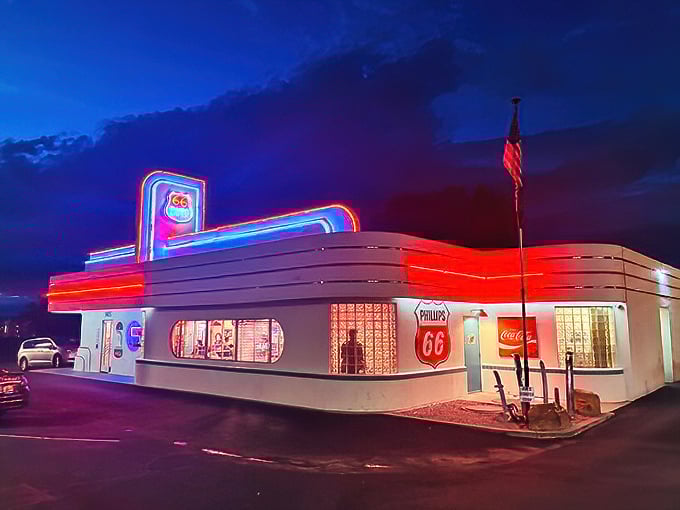 At night, the 66 Diner transforms into a neon wonderland that would make James Dean pull over for a midnight snack.