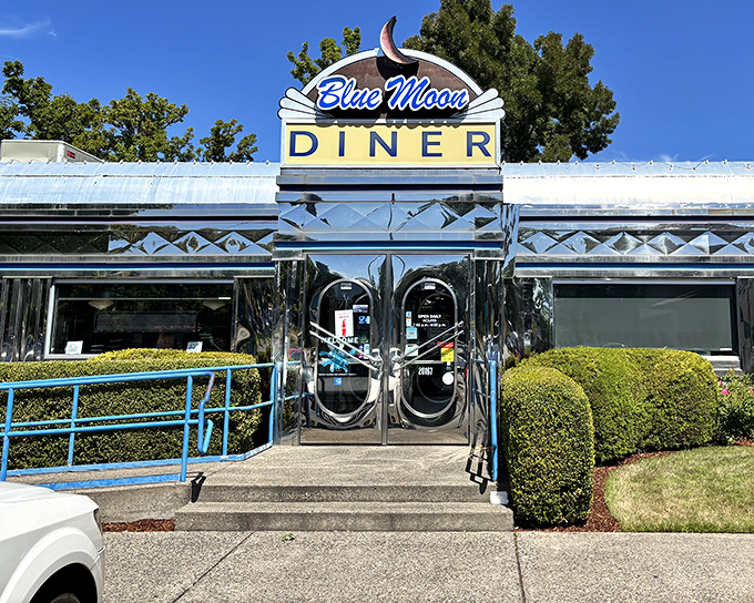 The gleaming chrome exterior of Blue Moon Diner shines like a beacon of breakfast hope. That iconic sign promises delicious nostalgia served all day.