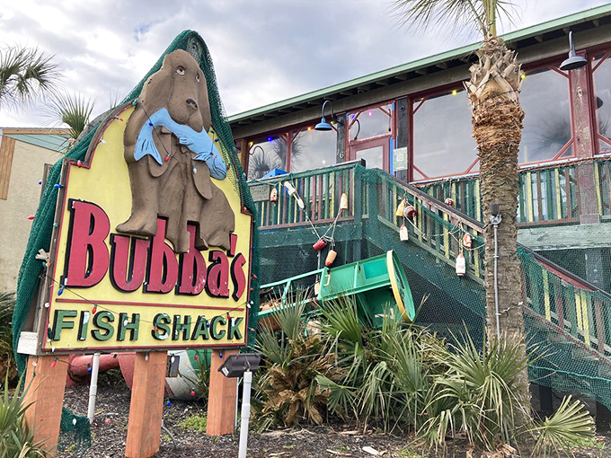 That iconic manatee mascot clutching a fish tells you everything &ndash; this isn't fancy dining, it's seafood paradise wrapped in weathered wood and coastal charm.