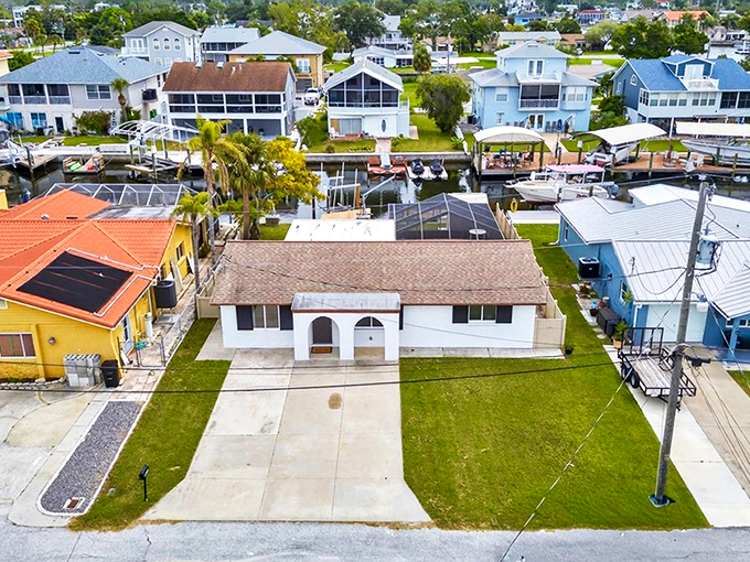 Hudson's canal-front homes offer waterfront living without the waterfront prices, proving paradise doesn't require a platinum credit card.